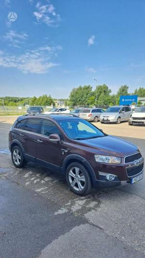 Red Chevrolet Captiva 2011 in Panevezys, with an engine capacity of 2.20 L and mileage of 221 thousand km for 4700 €, photo 8 on AUTOMOTO.COM.LV