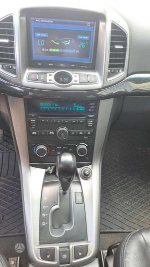 Red Chevrolet Captiva 2011 in Panevezys, with an engine capacity of 2.20 L and mileage of 221 thousand km for 4700 €, photo 12 on AUTOMOTO.COM.LV