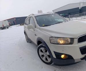 White Chevrolet Captiva 2012 in Siauliai, with an engine capacity of 2.20 L and mileage of 240 thousand km for 4850 €, photo 16 on AUTOMOTO.COM.LV