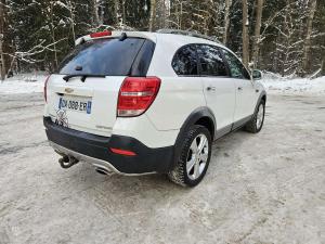 White Chevrolet Captiva 2013 in Taurage, with an engine capacity of 2.20 L and mileage of 180 thousand km for 5200 €, photo 6 on AUTOMOTO.COM.LV