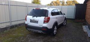 White Chevrolet Captiva 2013 in Vilnius, with an engine capacity of 2.20 L and mileage of 228 thousand km for 3750 €, photo 3 on AUTOMOTO.COM.LV