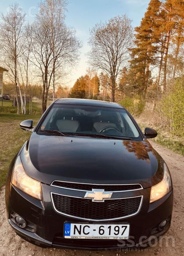 Melns Chevrolet Cruze 2011 Ogre, ar dzinēja tilpumu 2.00 L un nobraukumu 183 tūkst. km par 2900 €, foto 1 vietnē AUTOMOTO.COM.LV