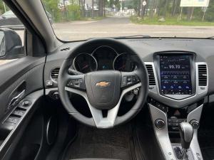 Black Chevrolet Cruze 2011 in Vilnius, with an engine capacity of 1.80 L and mileage of 223 thousand km for 3390 €, photo 11 on AUTOMOTO.COM.LV