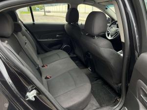 Black Chevrolet Cruze 2011 in Vilnius, with an engine capacity of 1.80 L and mileage of 223 thousand km for 3390 €, photo 13 on AUTOMOTO.COM.LV