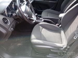 Black Chevrolet Cruze 2012 in Rezekne, with an engine capacity of 1.70 L and mileage of 194 thousand km for 3300 €, photo 13 on AUTOMOTO.COM.LV