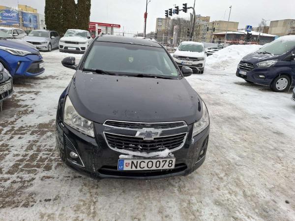 Black Chevrolet Cruze 2013 in Kaunas, with an engine capacity of 1.90 L and mileage of 176 thousand km for 4400 €, photo 2 on AUTOMOTO.COM.LV
