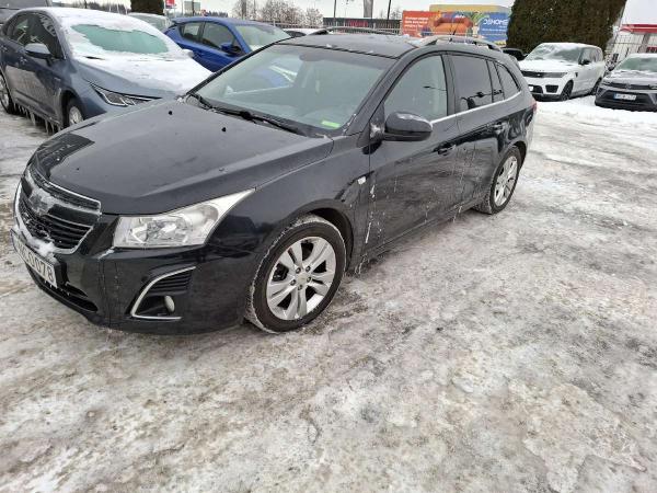 Black Chevrolet Cruze 2013 in Kaunas, with an engine capacity of 1.90 L and mileage of 176 thousand km for 4400 €, photo 3 on AUTOMOTO.COM.LV