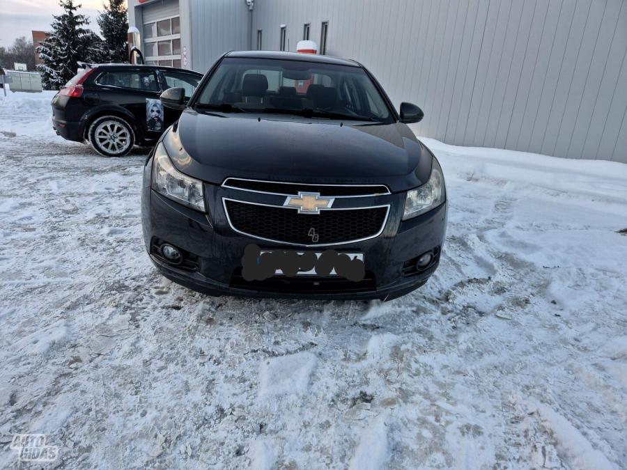 Black Chevrolet Cruze 2011 in Kaunas, with an engine capacity of 2.00 L and mileage of 267 thousand km for 2000 €, photo 5 on AUTOMOTO.COM.LV