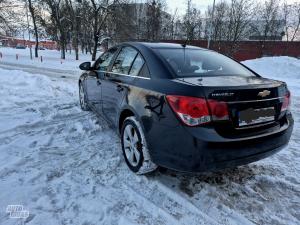 Black Chevrolet Cruze 2011 in Kaunas, with an engine capacity of 2.00 L and mileage of 267 thousand km for 2000 €, photo 6 on AUTOMOTO.COM.LV