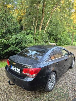 Melns Chevrolet Cruze 2011 Panevēža, ar dzinēja tilpumu 2.00 L un nobraukumu 240 tūkst. km par 2750 €, foto 4 vietnē AUTOMOTO.COM.LV
