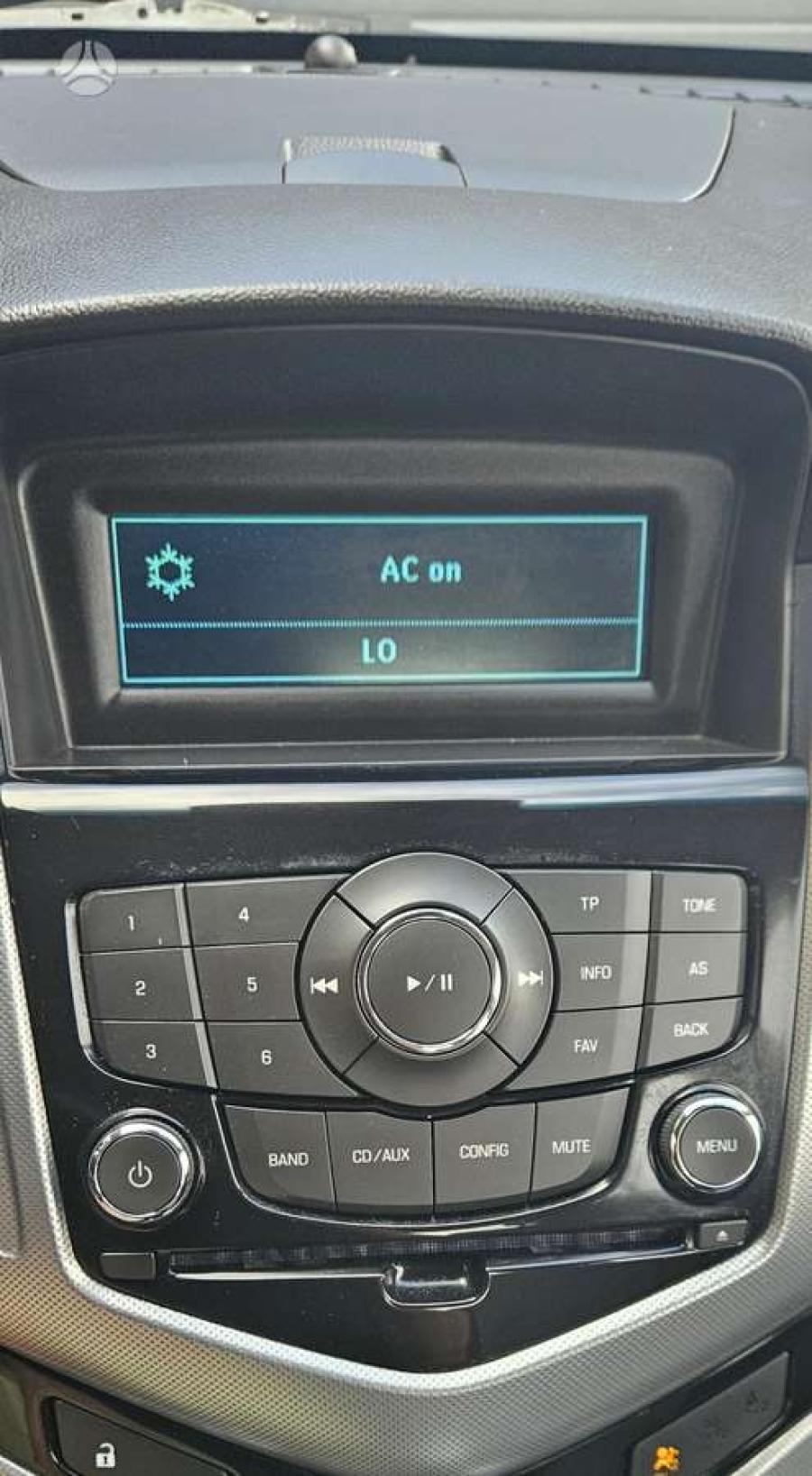 Black Chevrolet Cruze 2011 in Siauliai, with an engine capacity of 2.00 L and mileage of 170 thousand km for 3499 €, photo 19 on AUTOMOTO.COM.LV