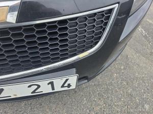 Black Chevrolet Cruze 2012 in Vilnius, with an engine capacity of 2.00 L and mileage of 261 thousand km for 1600 €, photo 11 on AUTOMOTO.COM.LV