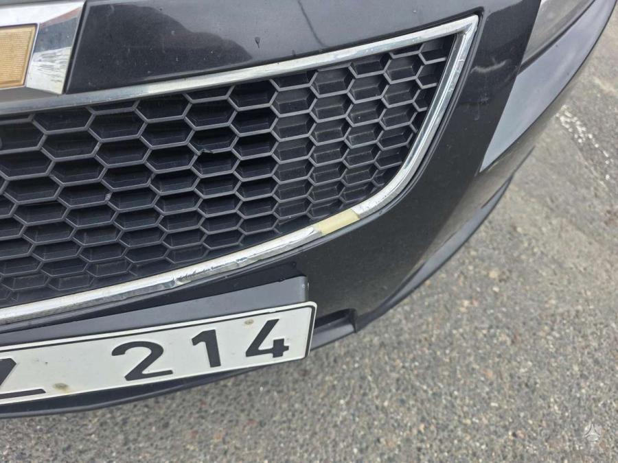 Black Chevrolet Cruze 2012 in Vilnius, with an engine capacity of 2.00 L and mileage of 261 thousand km for 1600 €, photo 11 on AUTOMOTO.COM.LV