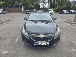 Black Chevrolet Cruze 2012 in Vilnius, with an engine capacity of 2.00 L and mileage of 261 thousand km for 1600 €, photo 12 on AUTOMOTO.COM.LV