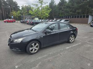 Black Chevrolet Cruze 2012 in Vilnius, with an engine capacity of 2.00 L and mileage of 261 thousand km for 1600 €, photo 15 on AUTOMOTO.COM.LV