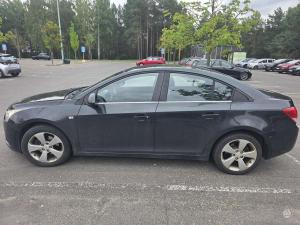 Black Chevrolet Cruze 2012 in Vilnius, with an engine capacity of 2.00 L and mileage of 261 thousand km for 1600 €, photo 16 on AUTOMOTO.COM.LV