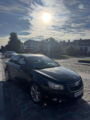 Black Chevrolet Cruze 2012 in Klaipeda, with an engine capacity of 1.40 L and mileage of 237 thousand km for 2750 €, photo 4 on AUTOMOTO.COM.LV