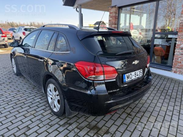 Black Chevrolet Cruze 2013 in Talsi, with an engine capacity of 1.70 L and mileage of 255 thousand km for 4470 €, photo 2 on AUTOMOTO.COM.LV