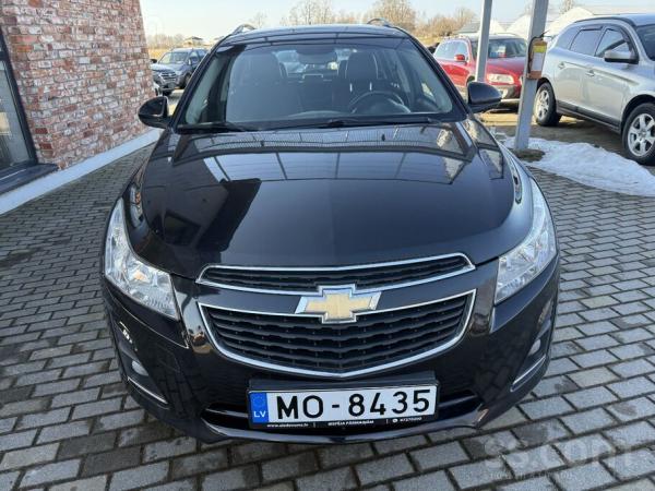 Black Chevrolet Cruze 2013 in Talsi, with an engine capacity of 1.70 L and mileage of 255 thousand km for 4470 €, photo 6 on AUTOMOTO.COM.LV