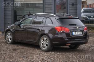 Black Chevrolet Cruze 2013 in Liepaja, with an engine capacity of 2.00 L and mileage of 205 thousand km for 4300 €, photo 2 on AUTOMOTO.COM.LV