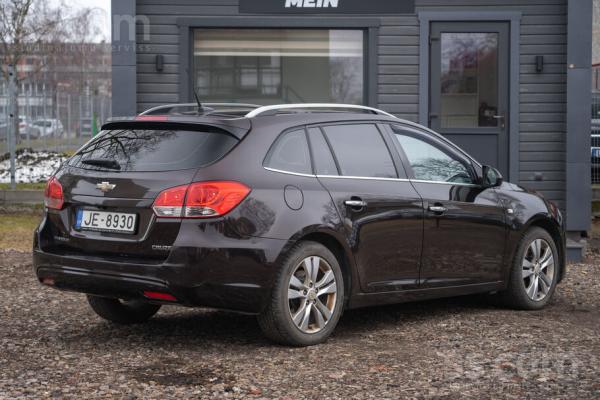 Black Chevrolet Cruze 2013 in Liepaja, with an engine capacity of 2.00 L and mileage of 205 thousand km for 4300 €, photo 4 on AUTOMOTO.COM.LV