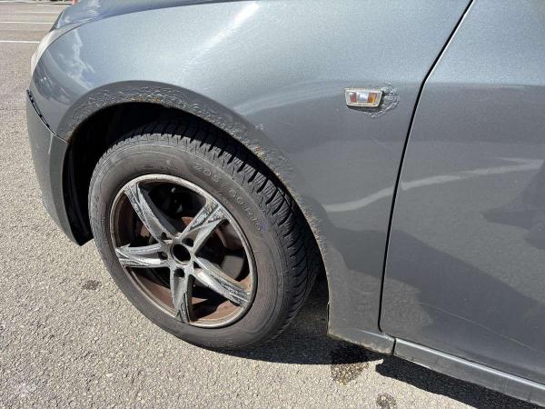 Grey Chevrolet Cruze 2010 in Siauliai, with an engine capacity of 1.99 L and mileage of 284 thousand km for 2178 €, photo 9 on AUTOMOTO.COM.LV