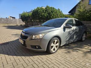 Pelēks Chevrolet Cruze 2010 Kauņa, ar dzinēja tilpumu 2.00 L un nobraukumu 350 tūkst. km par 1250 €, foto  vietnē AUTOMOTO.COM.LV