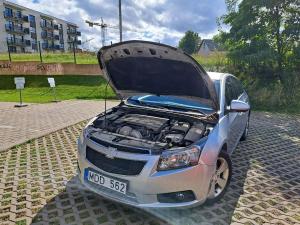 Grey Chevrolet Cruze 2012 in Vilnius, with an engine capacity of 1.99 L and mileage of 233 thousand km for 1950 €, photo 4 on AUTOMOTO.COM.LV