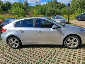 Grey Chevrolet Cruze 2012 in Vilnius, with an engine capacity of 1.99 L and mileage of 233 thousand km for 1950 €, photo 7 on AUTOMOTO.COM.LV
