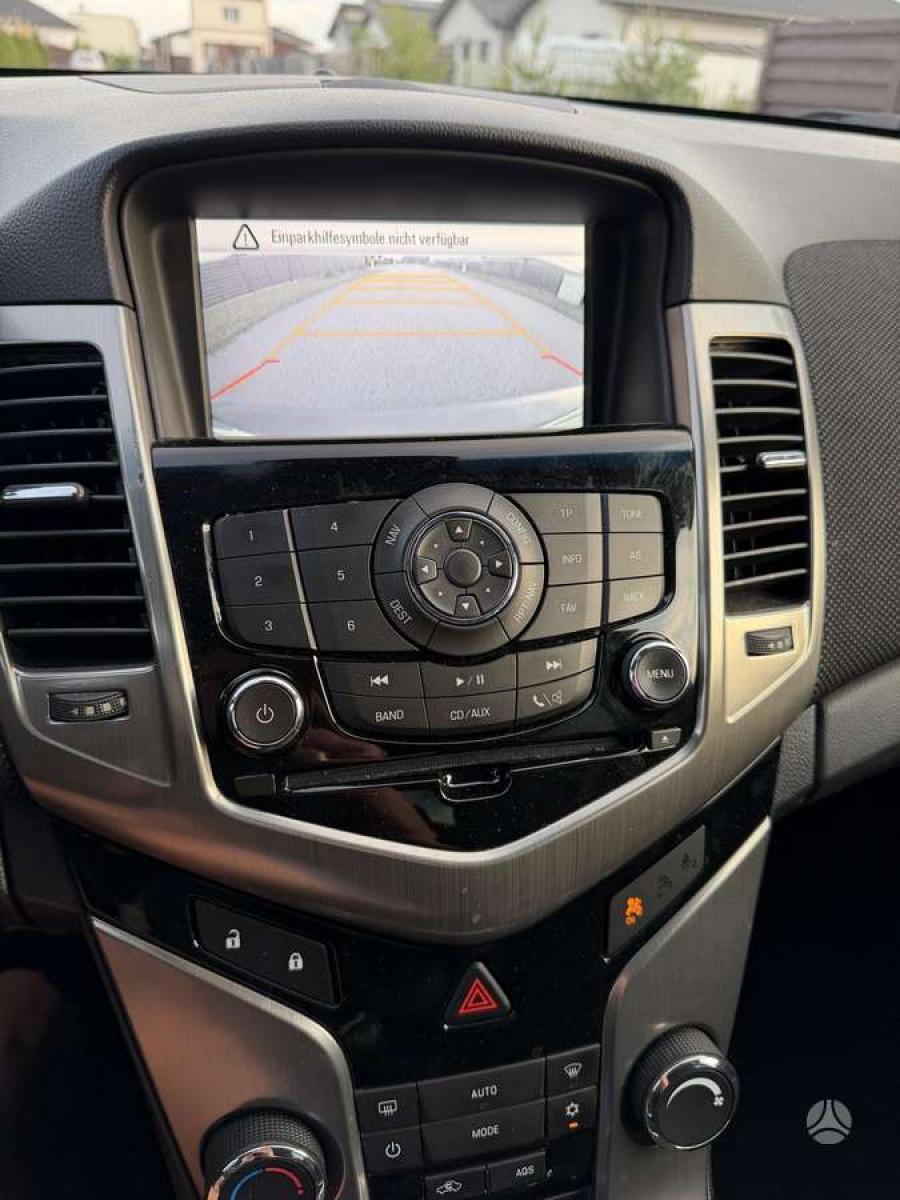 Grey Chevrolet Cruze 2013 in Klaipeda, with an engine capacity of 2.00 L and mileage of 276 thousand km for 2850 €, photo 18 on AUTOMOTO.COM.LV