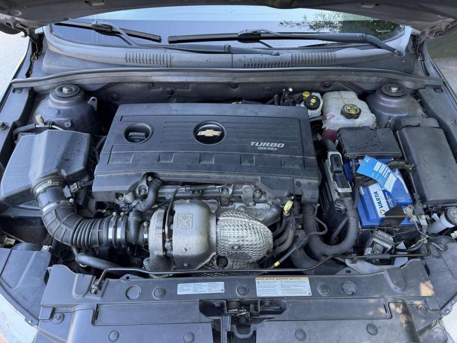 Grey Chevrolet Cruze 2013 in Klaipeda, with an engine capacity of 2.00 L and mileage of 276 thousand km for 2850 €, photo 28 on AUTOMOTO.COM.LV