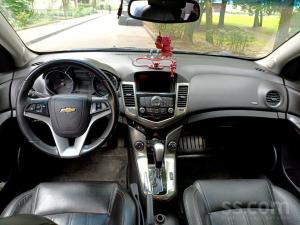 Grey Chevrolet Cruze 2013 in Riga, with an engine capacity of 2.00 L and mileage of 215 thousand km for 5000 €, photo 4 on AUTOMOTO.COM.LV