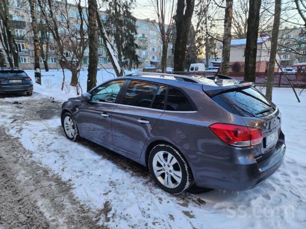 Grey Chevrolet Cruze 2013 in Riga, with an engine capacity of 2.00 L and mileage of 215 thousand km for 5000 €, photo 6 on AUTOMOTO.COM.LV