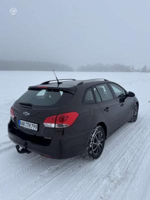 Red Chevrolet Cruze 2012 in Birzai, with an engine capacity of 1.69 L and mileage of 249 thousand km for 2999 €, photo 10 on AUTOMOTO.COM.LV