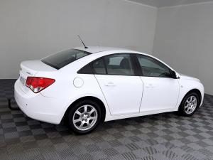 Белый Шевроле Круз 2010 в Таллин, объемом двигателя 2.00 л и пробегом 334 тыс. км за 1399 €, фото 11 на AUTOMOTO.COM.LV