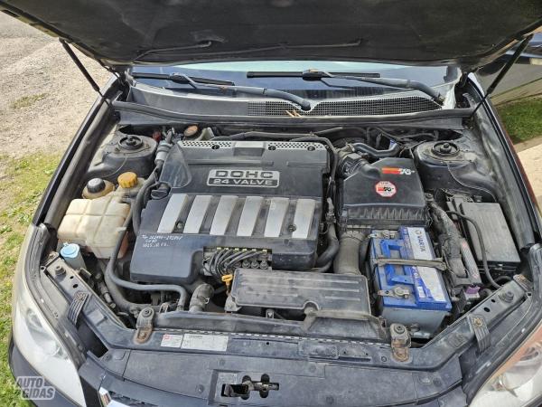 Black Chevrolet Epica 2006 in Silute, with an engine capacity of 2.50 L and mileage of 275 thousand km for 1550 €, photo 8 on AUTOMOTO.COM.LV