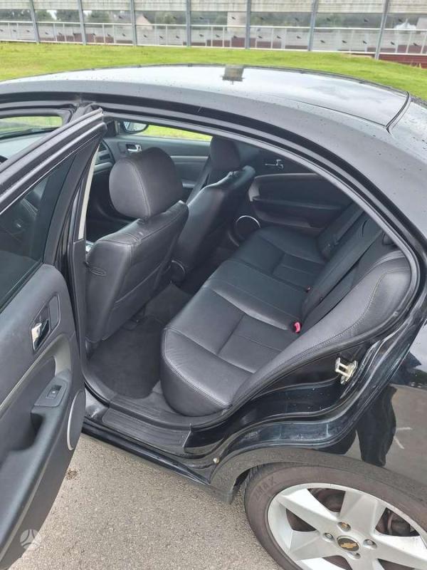 Black Chevrolet Epica 2008 in Kazlu Ruda, with an engine capacity of 2.50 L and mileage of 446 thousand km for 1100 €, photo 9 on AUTOMOTO.COM.LV