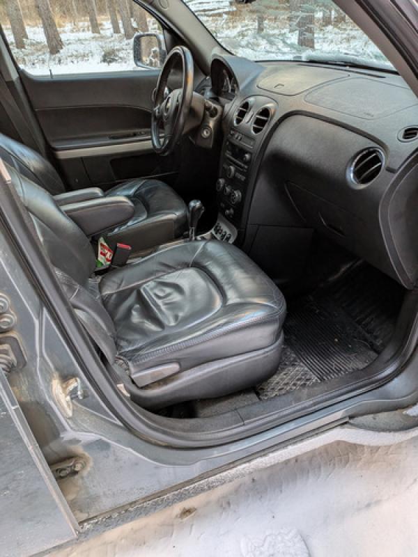 Grey Chevrolet HHR 2009 in Haapsalu, with an engine capacity of 2.40 L and mileage of 284 thousand km for 3999 €, photo 8 on AUTOMOTO.COM.LV