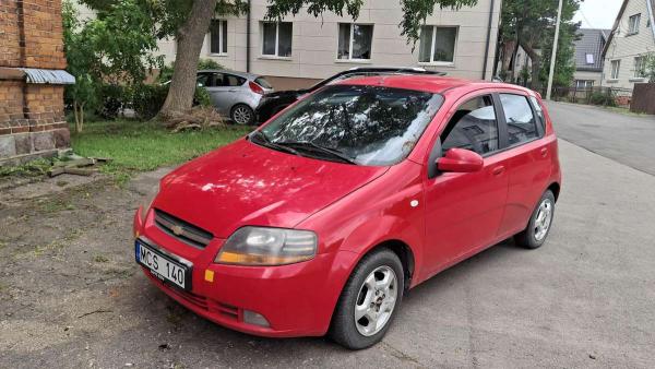 Red Chevrolet Kalos 2005 in Kaunas, with an engine capacity of 1.40 L and mileage of 24 thousand km for 700 €, photo 1 on AUTOMOTO.COM.LV