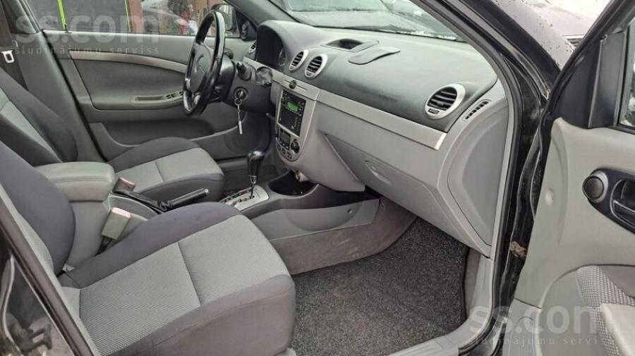 Black Chevrolet Lacetti 2007 in Riga, with an engine capacity of 2.00 L and mileage of 169 thousand km for 2950 €, photo 9 on AUTOMOTO.COM.LV