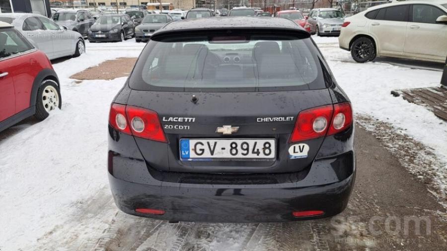 Black Chevrolet Lacetti 2007 in Riga, with an engine capacity of 2.00 L and mileage of 169 thousand km for 2950 €, photo 11 on AUTOMOTO.COM.LV