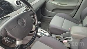 Black Chevrolet Lacetti 2007 in Riga, with an engine capacity of 2.00 L and mileage of 169 thousand km for 2950 €, photo 12 on AUTOMOTO.COM.LV