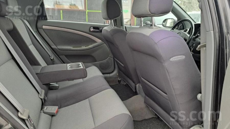 Black Chevrolet Lacetti 2007 in Riga, with an engine capacity of 2.00 L and mileage of 169 thousand km for 2950 €, photo 14 on AUTOMOTO.COM.LV