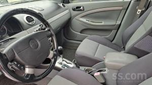 Black Chevrolet Lacetti 2007 in Riga, with an engine capacity of 2.00 L and mileage of 169 thousand km for 2950 €, photo 18 on AUTOMOTO.COM.LV