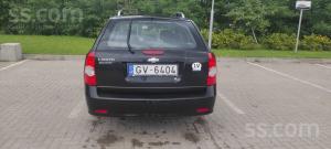 Black Chevrolet Lacetti 2007 in Jelgava, with an engine capacity of 2.00 L and mileage of 168 thousand km for 1500 €, photo 11 on AUTOMOTO.COM.LV