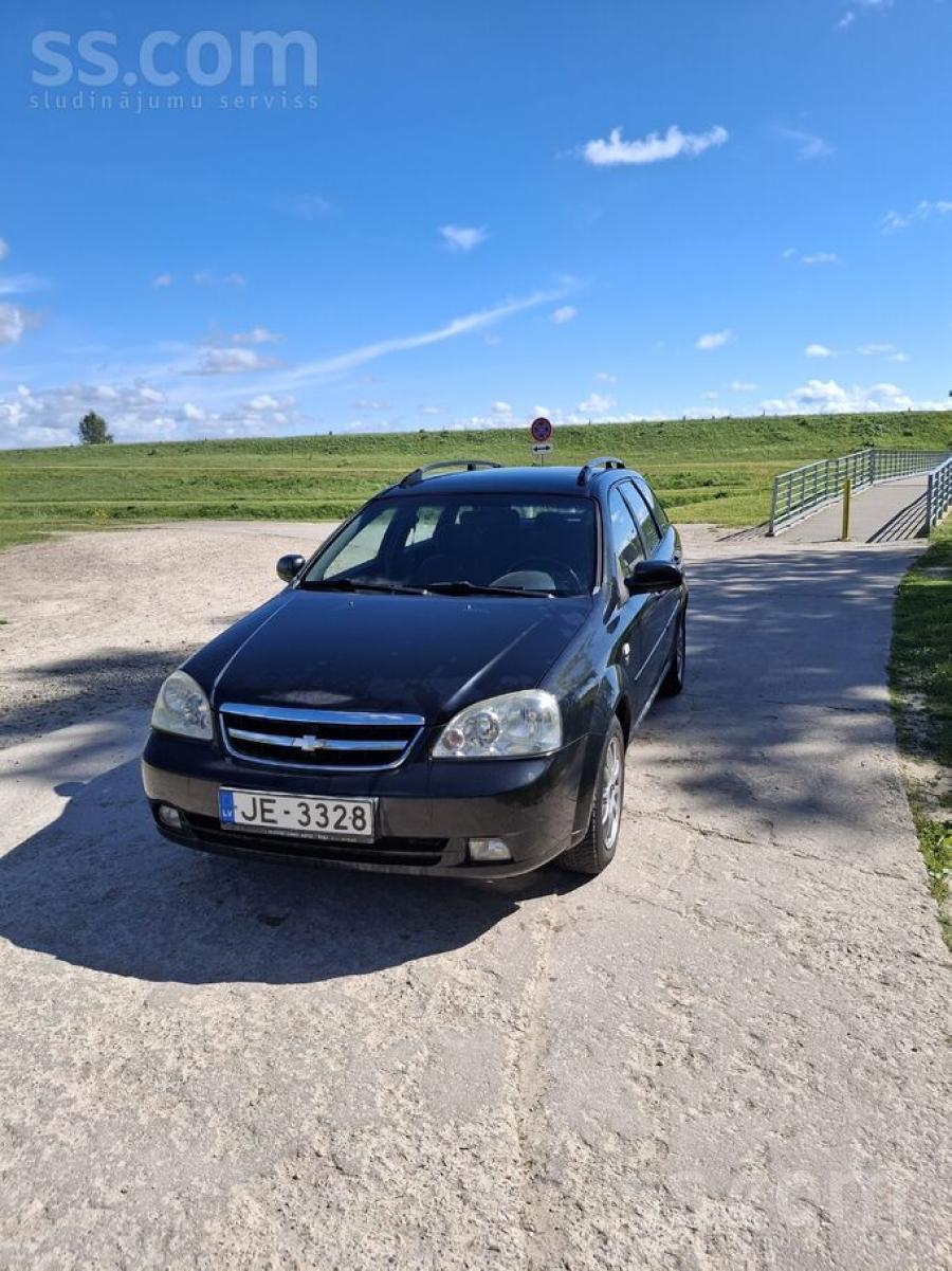 Black Chevrolet Lacetti 2008 in Riga, with an engine capacity of 2.00 L and mileage of 205 thousand km for 1250 €, photo 1 on AUTOMOTO.COM.LV