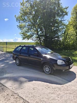 Black Chevrolet Lacetti 2008 in Riga, with an engine capacity of 2.00 L and mileage of 205 thousand km for 1250 €, photo 3 on AUTOMOTO.COM.LV