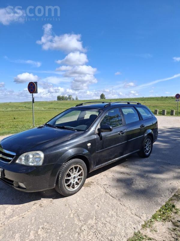 Black Chevrolet Lacetti 2008 in Riga, with an engine capacity of 2.00 L and mileage of 205 thousand km for 1250 €, photo 3 on AUTOMOTO.COM.LV