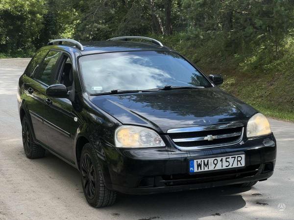 Black Chevrolet Lacetti 2008 in Vilnius, with an engine capacity of 1.60 L and mileage of 250 thousand km for 950 €, photo 2 on AUTOMOTO.COM.LV
