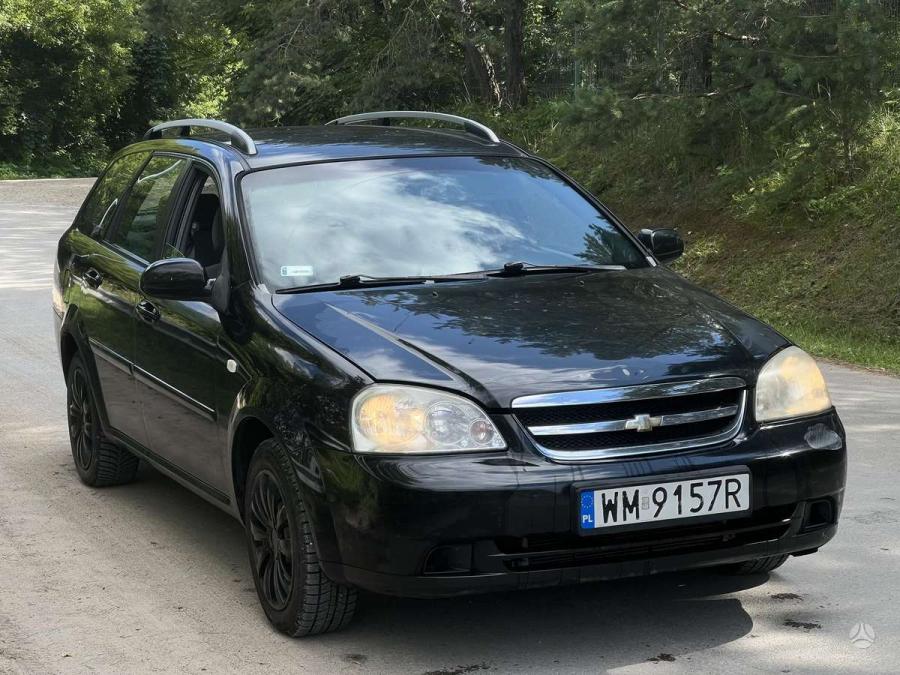 Black Chevrolet Lacetti 2008 in Vilnius, with an engine capacity of 1.60 L and mileage of 250 thousand km for 950 €, photo 3 on AUTOMOTO.COM.LV
